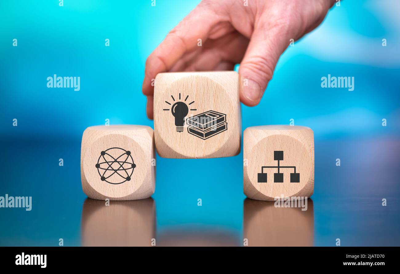 Wooden blocks with symbol of knowledge concept on blue background Stock ...
