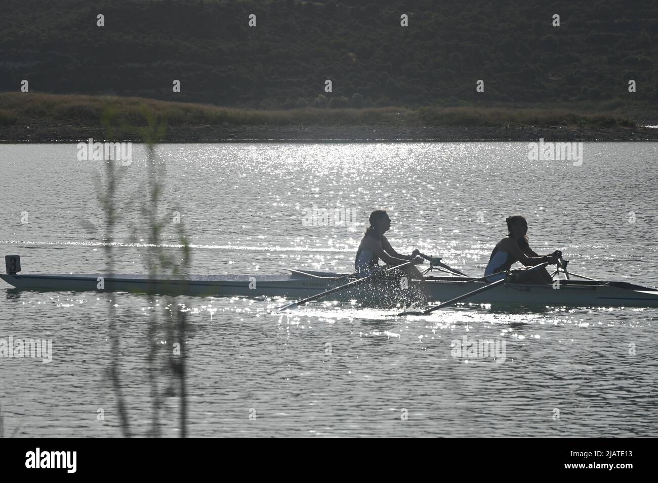 Rowing boat in dusk hi-res stock photography and images - Alamy