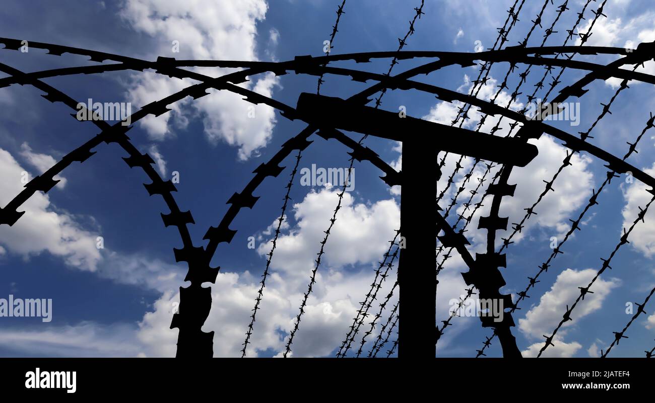 Сontour of barbed wire on background beautiful clouds and sky Stock ...
