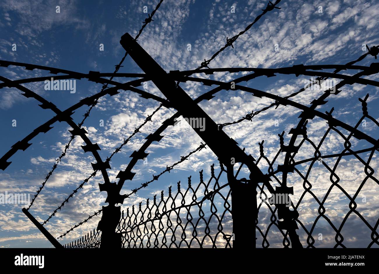 Сontour of barbed wire on background beautiful clouds and sky Stock ...
