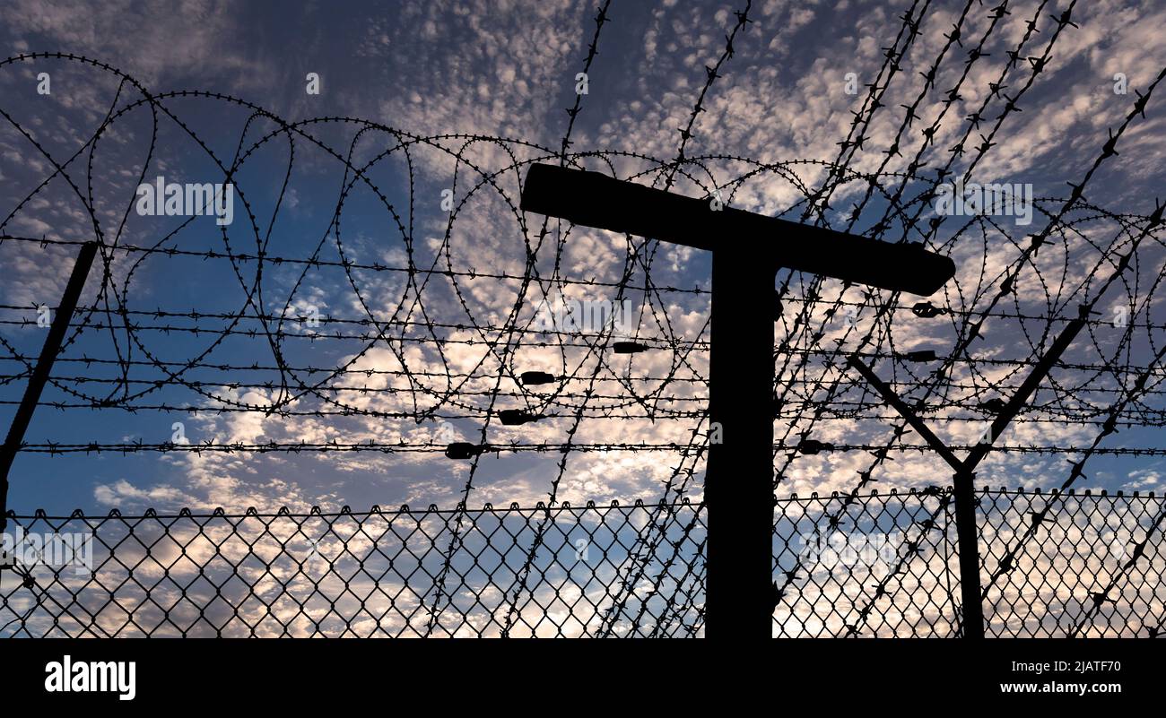 Сontour of barbed wire on background beautiful clouds and sky Stock ...