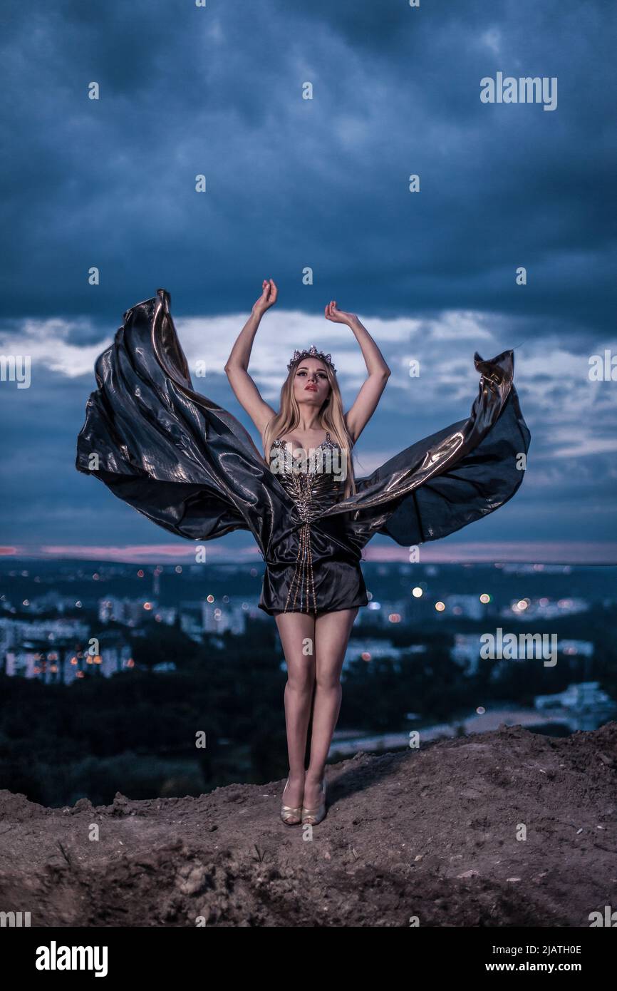 Beautiful woman in twilight hi-res stock photography and images - Alamy