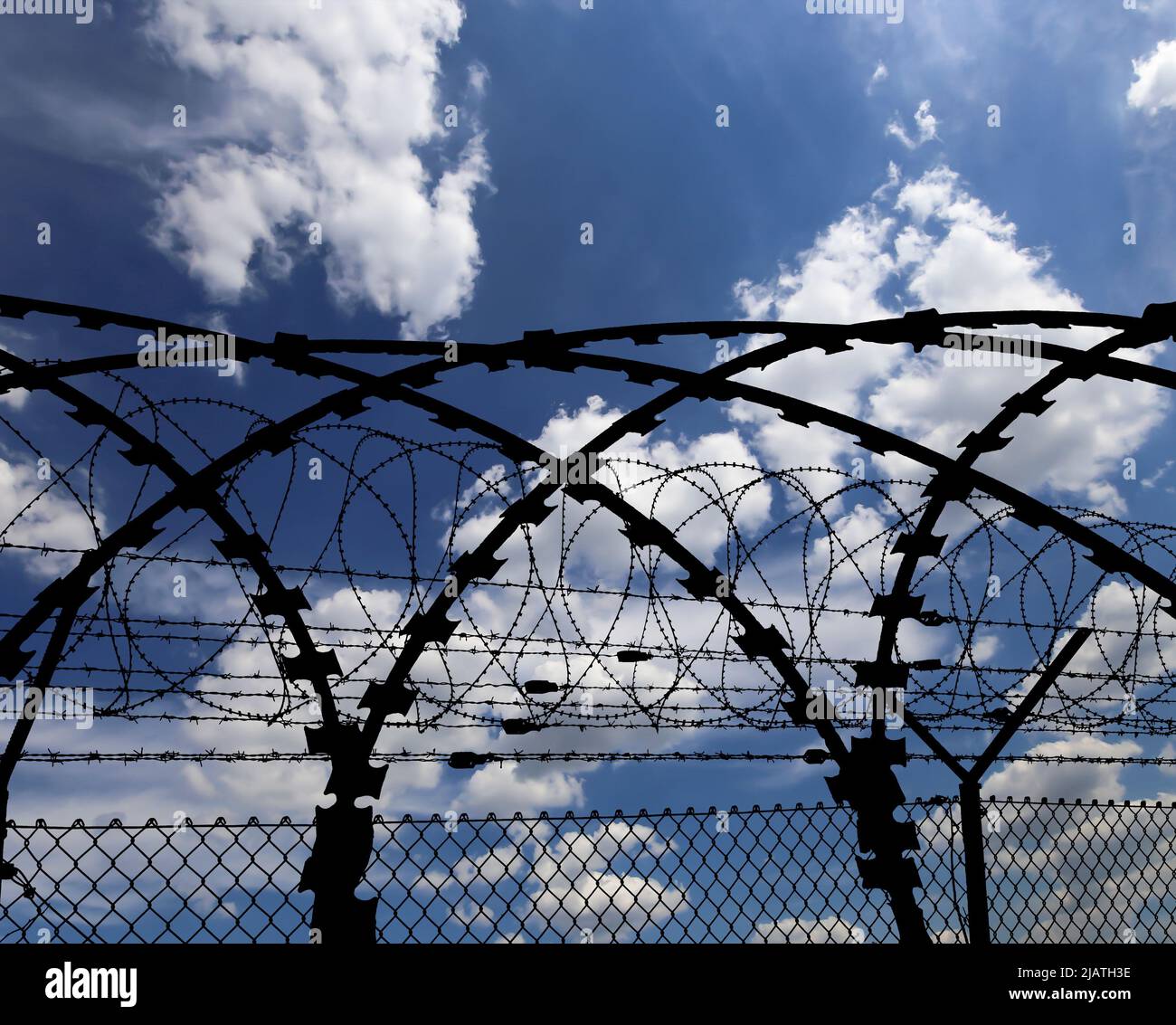 Сontour of barbed wire on background beautiful clouds and sky Stock ...