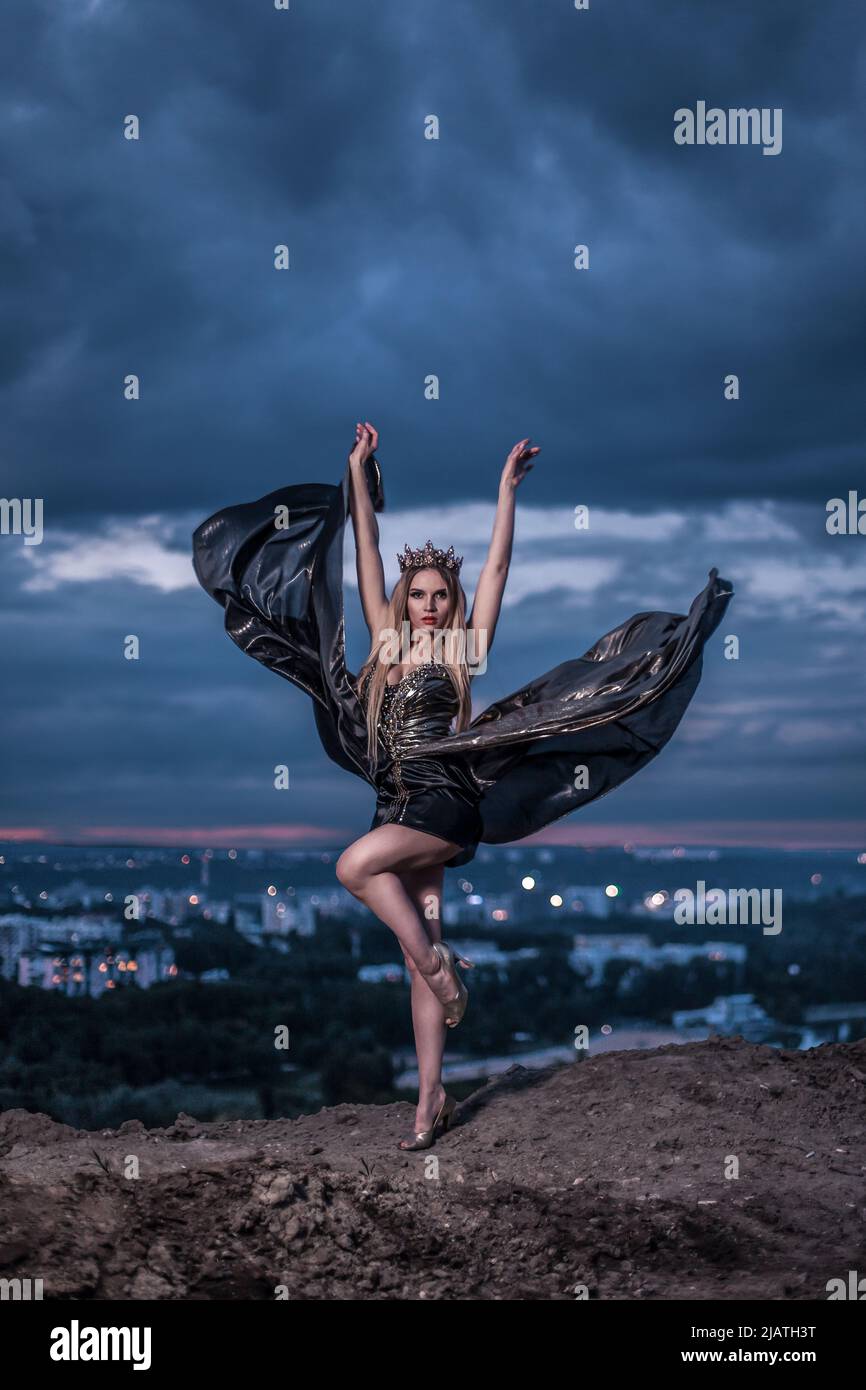 Beautiful woman in twilight hi-res stock photography and images - Alamy