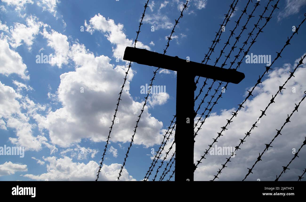 Сontour of barbed wire on background beautiful clouds and sky Stock ...
