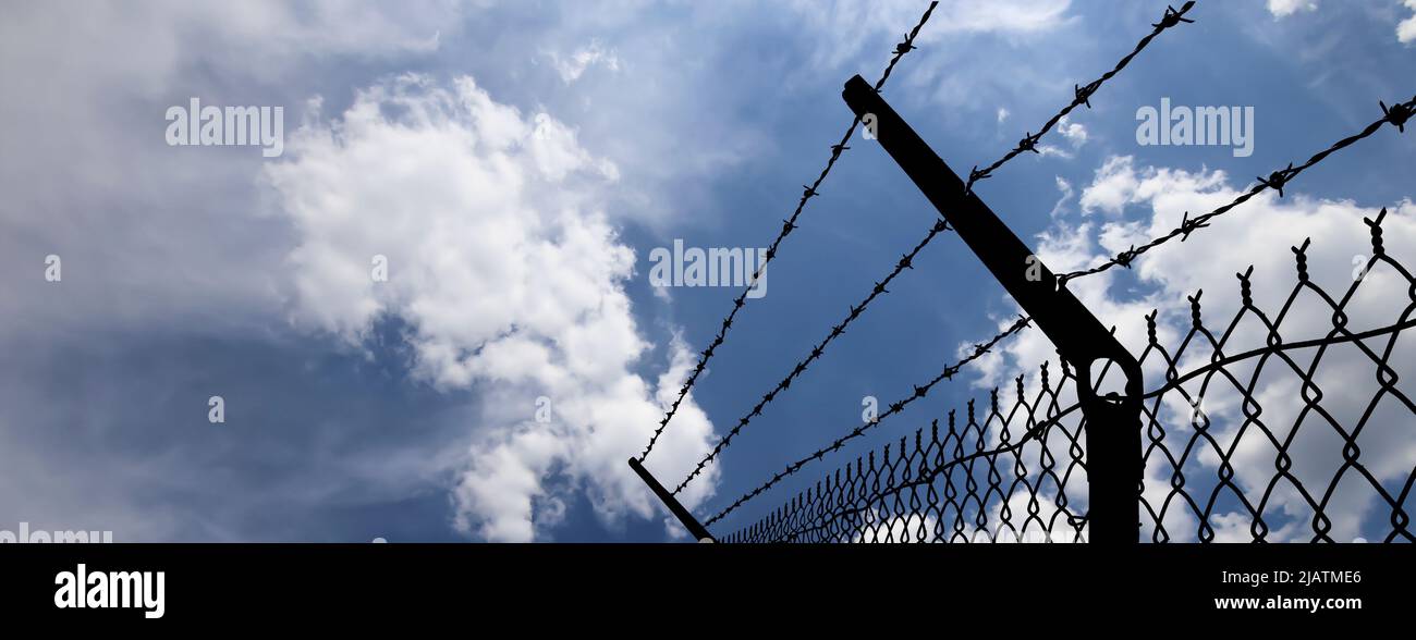 Сontour of barbed wire on background beautiful clouds and sky Stock ...
