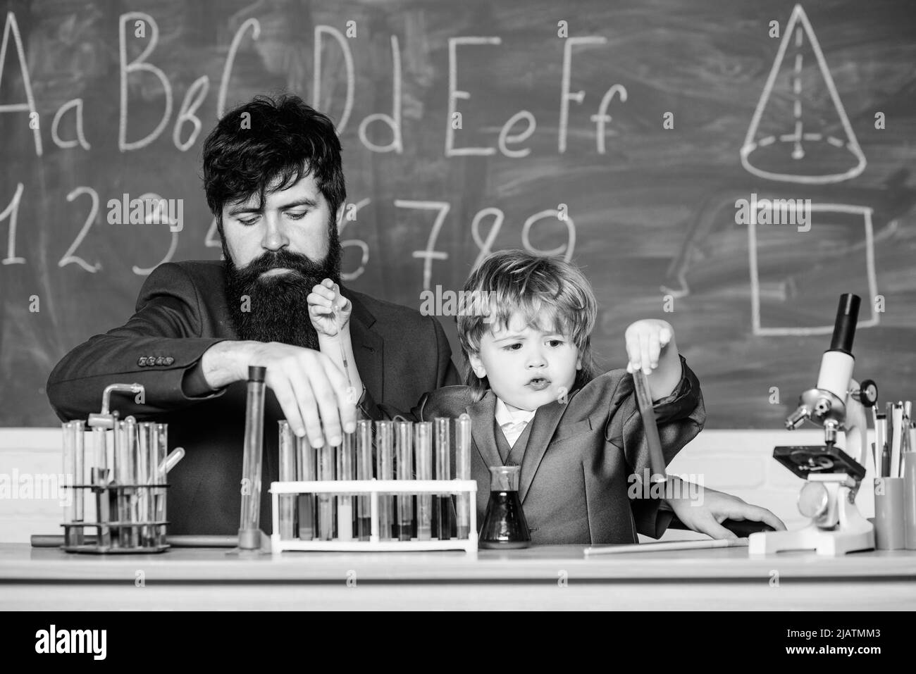 our challenge is our progress. Back to school. Laboratory test tubes ...