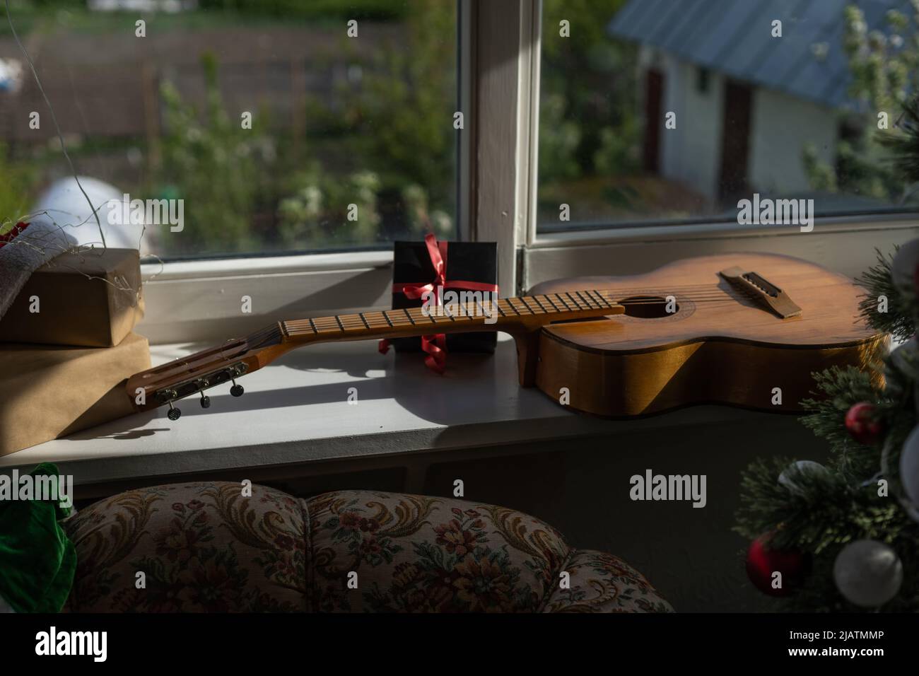 guitar with Christmas presents. Concept image for holiday musical event ...