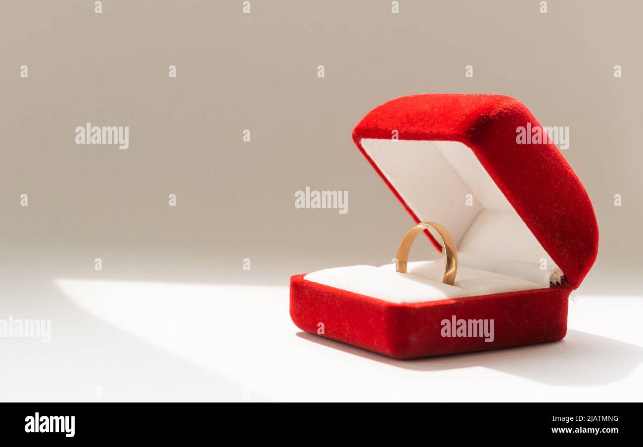 wedding ring in a red box Stock Photo - Alamy