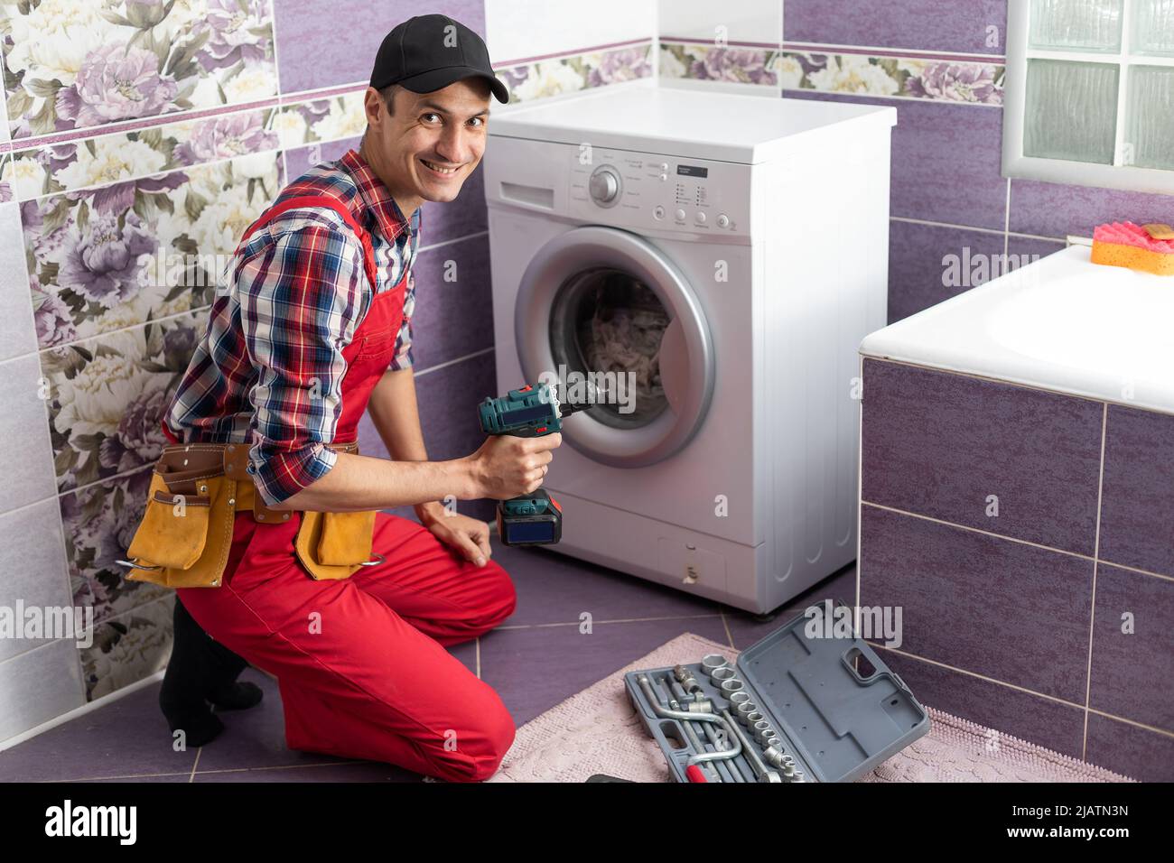 Fixing interior washing machine hi-res stock photography and images - Alamy