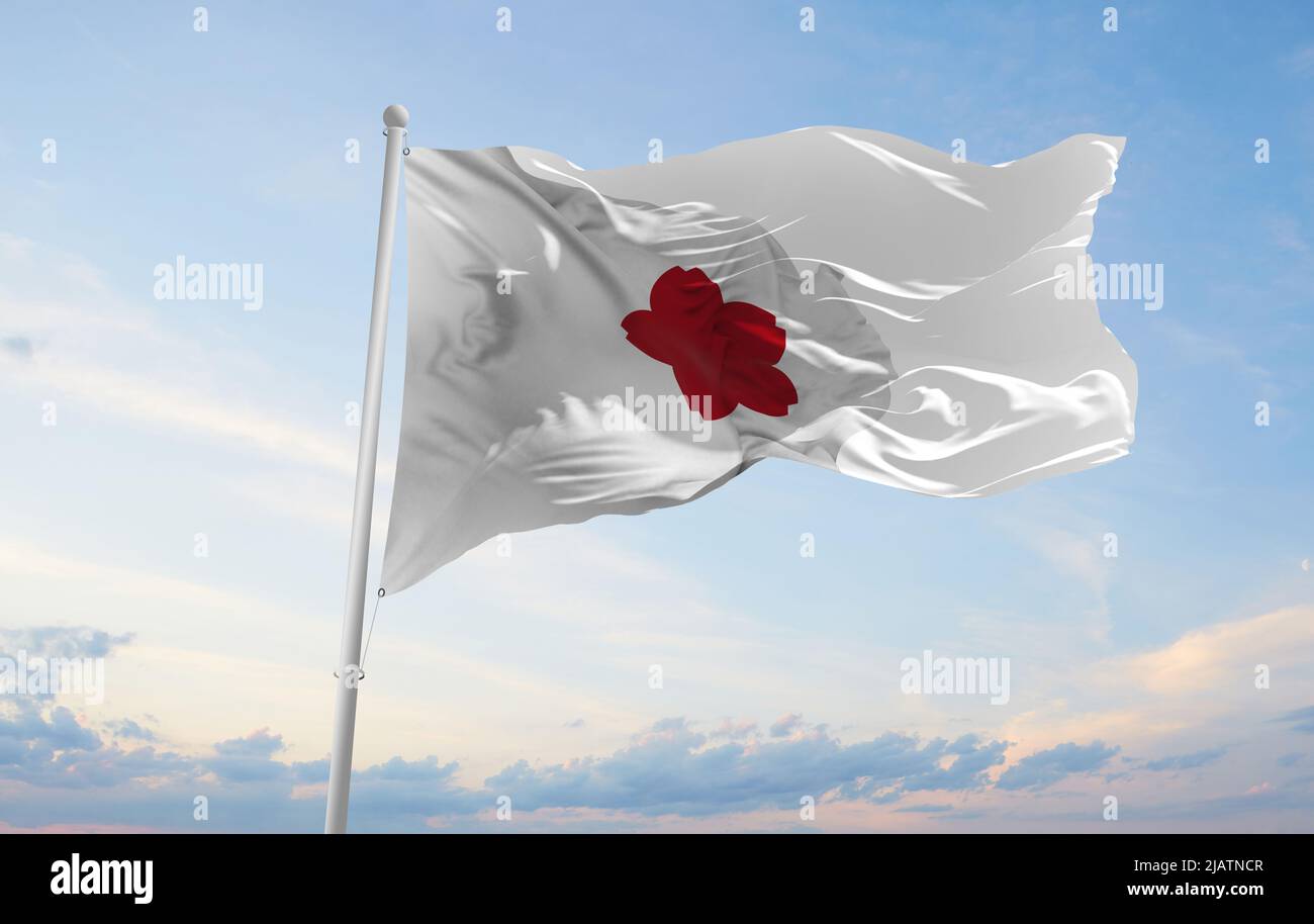 official flag of Standard of Commodore , Japan at cloudy sky background ...