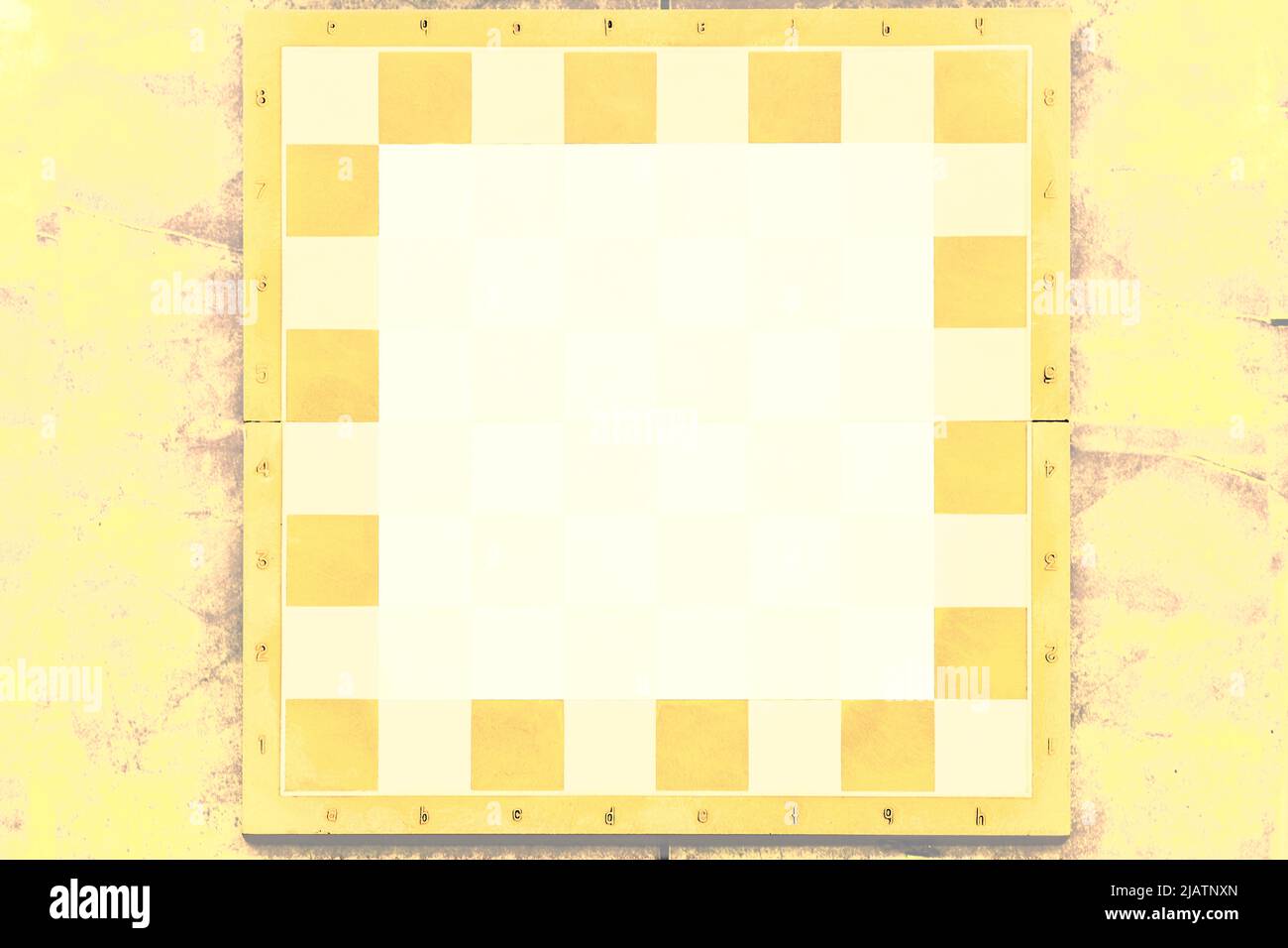Yellow abstract chess board on yellow background with place for text ...