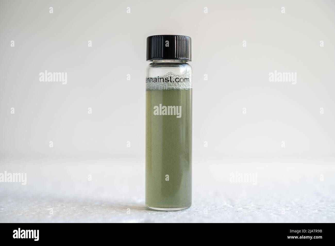 Sample from polluted stream water in a cuvette Stock Photo - Alamy