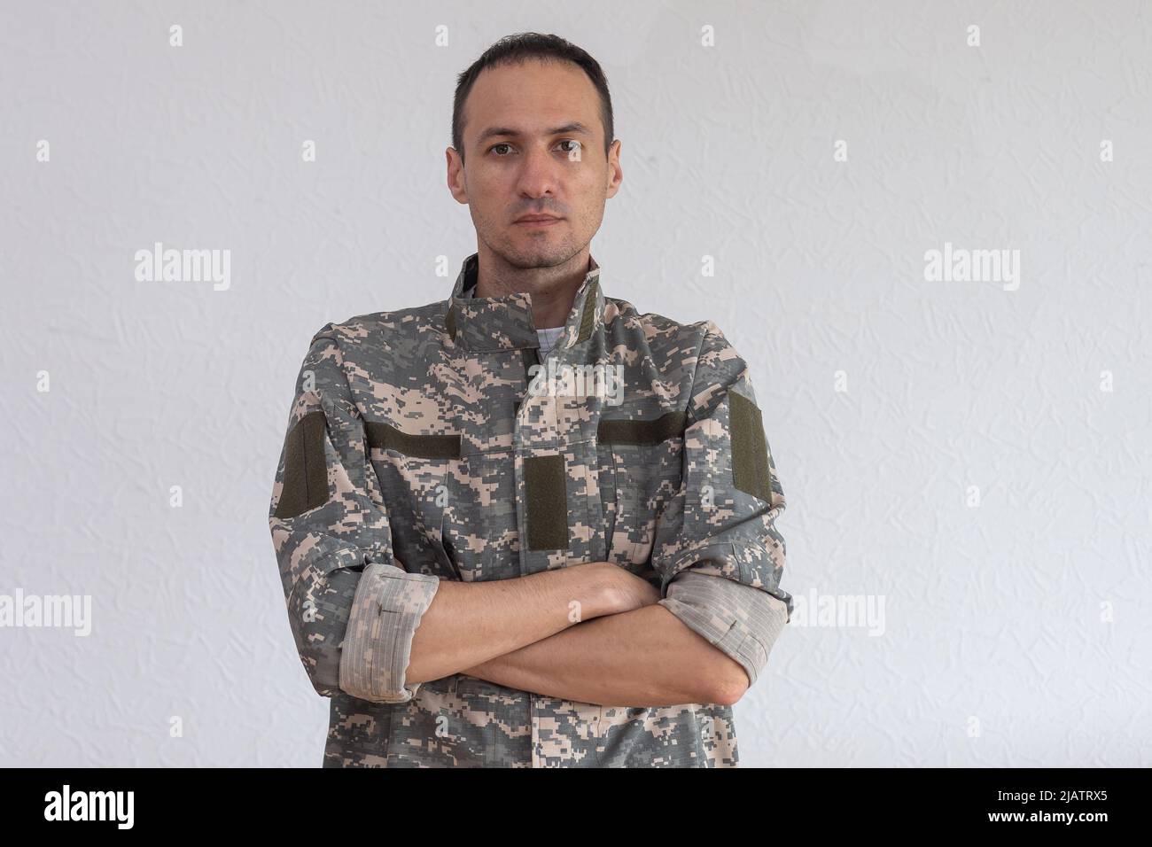 Portrait of a soldier, military white background Stock Photo - Alamy