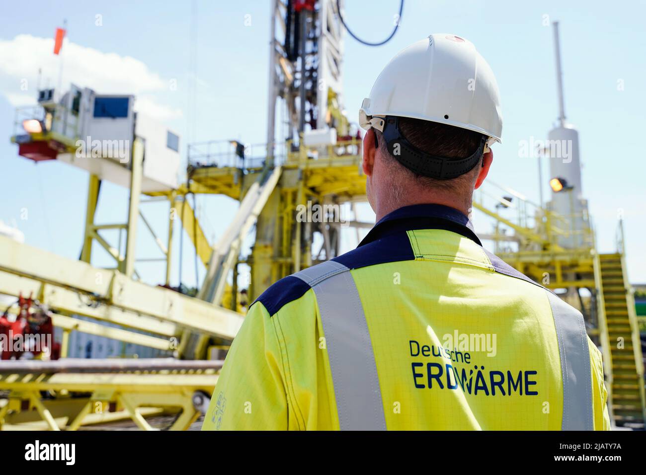 Graben Neudorf, Germany. 01st June, 2022. An employee wearing a jacket ...