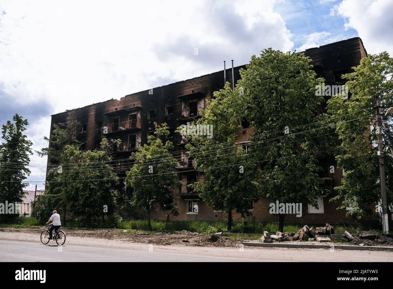 War in Ukraine. A burnt civilian house from the Russian military in the ...