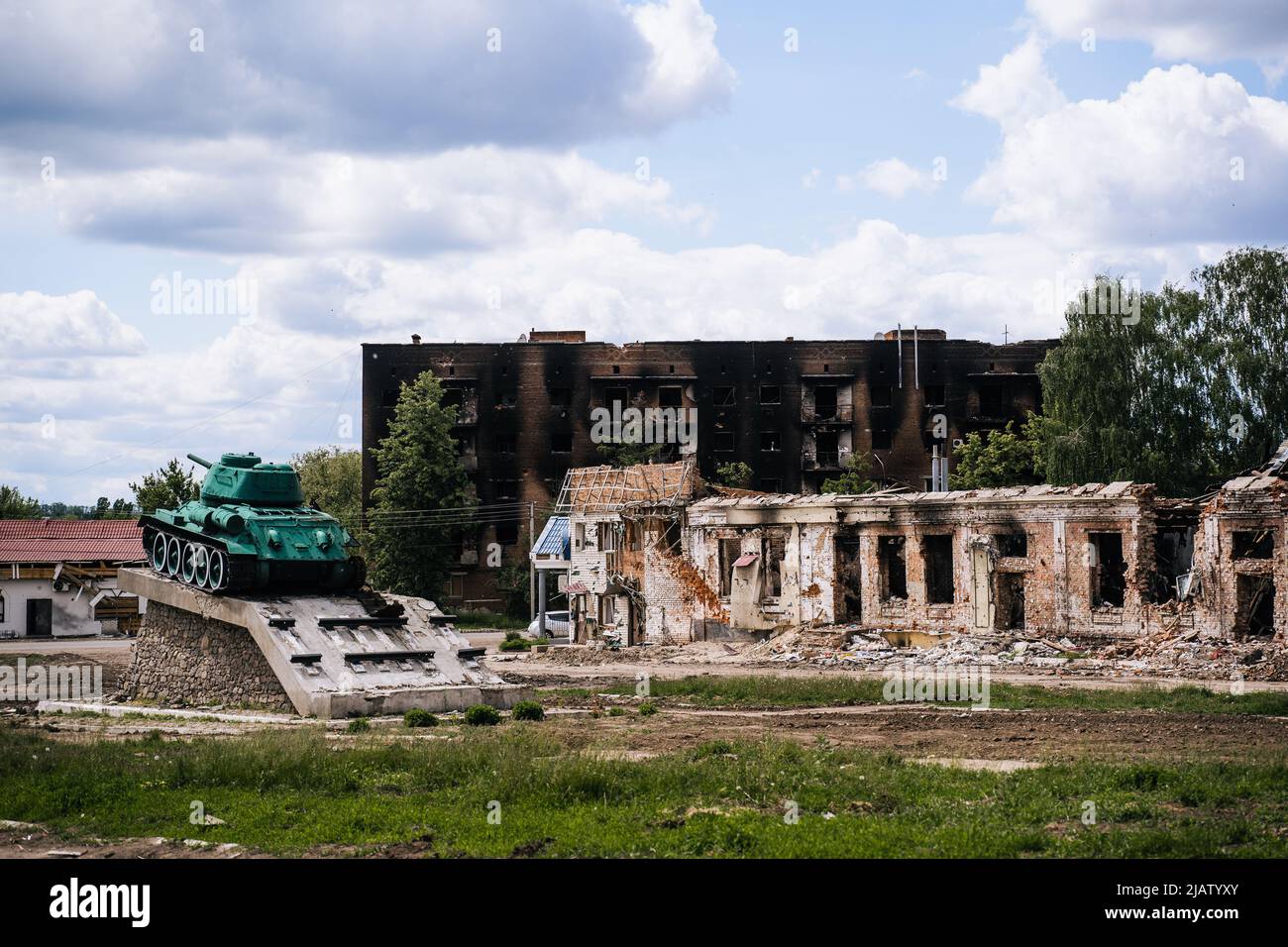 War in Ukraine. Destroyed tank on the central square in the city of ...