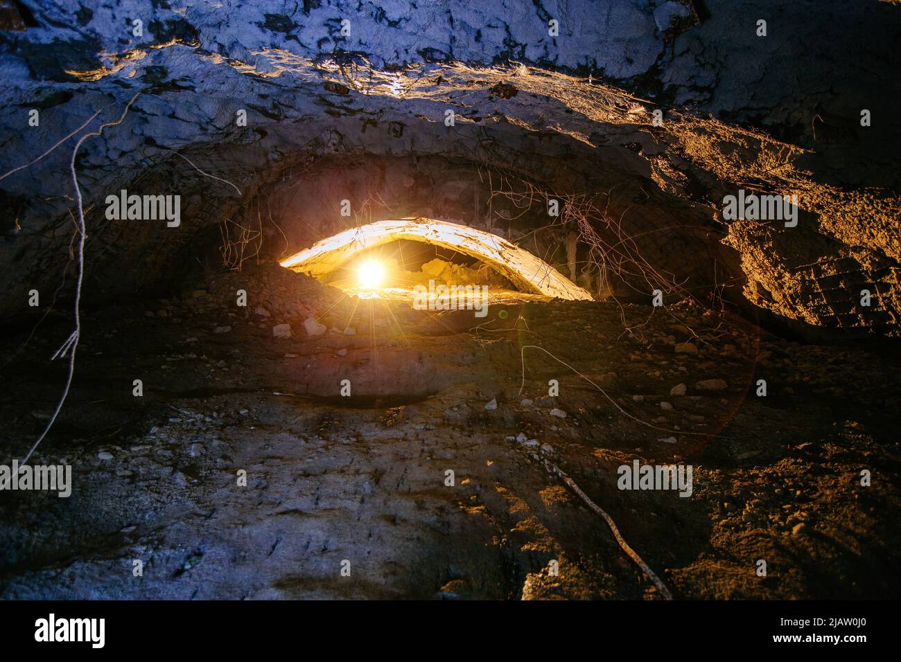 Dark dirty collapsed mine tunnel Stock Photo - Alamy