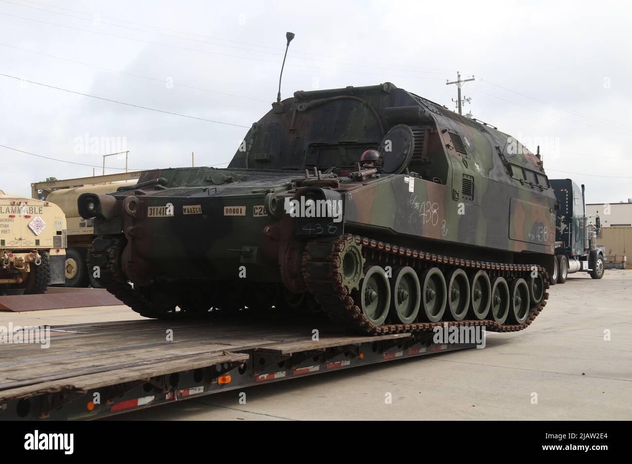 An M992 Field Artillery Ammunition Support Vehicle drives onto a ...