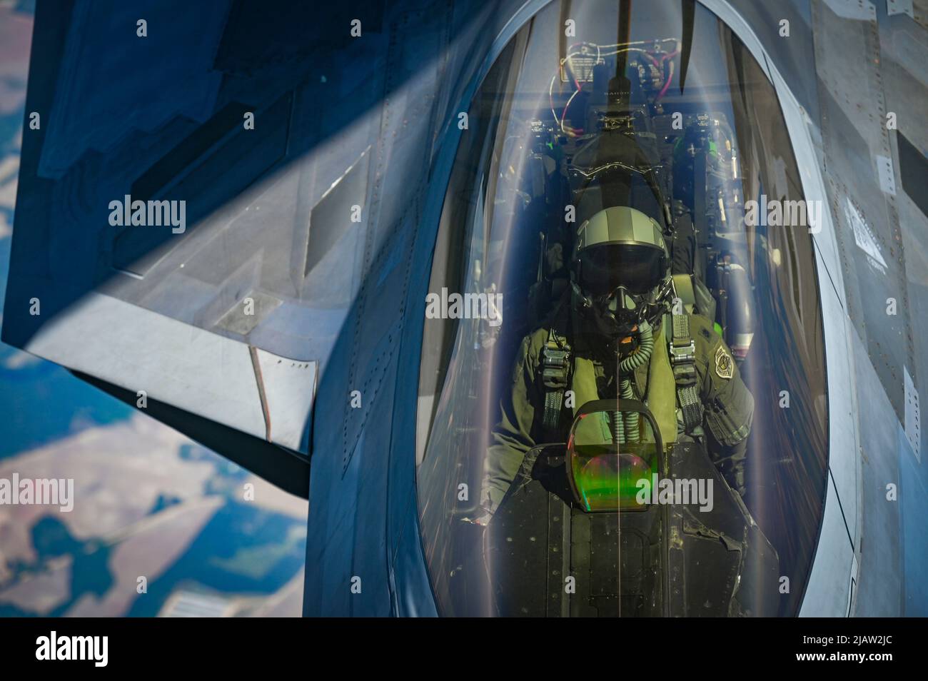 A U.S. Air Force F-22 Raptor with the 325th Fighter Wing, approaches a ...