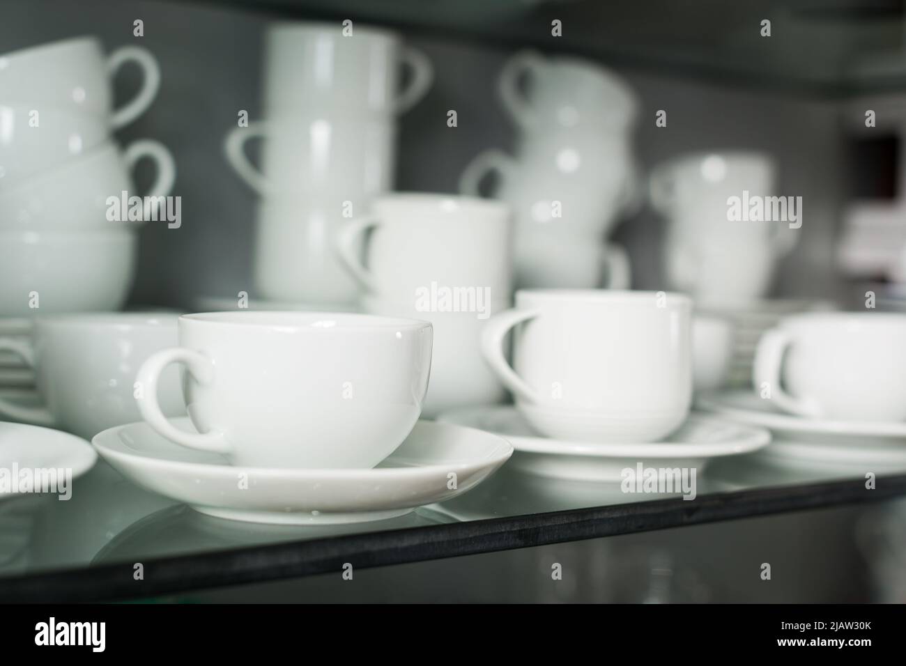 Ceramic cups in shop Stock Photo - Alamy