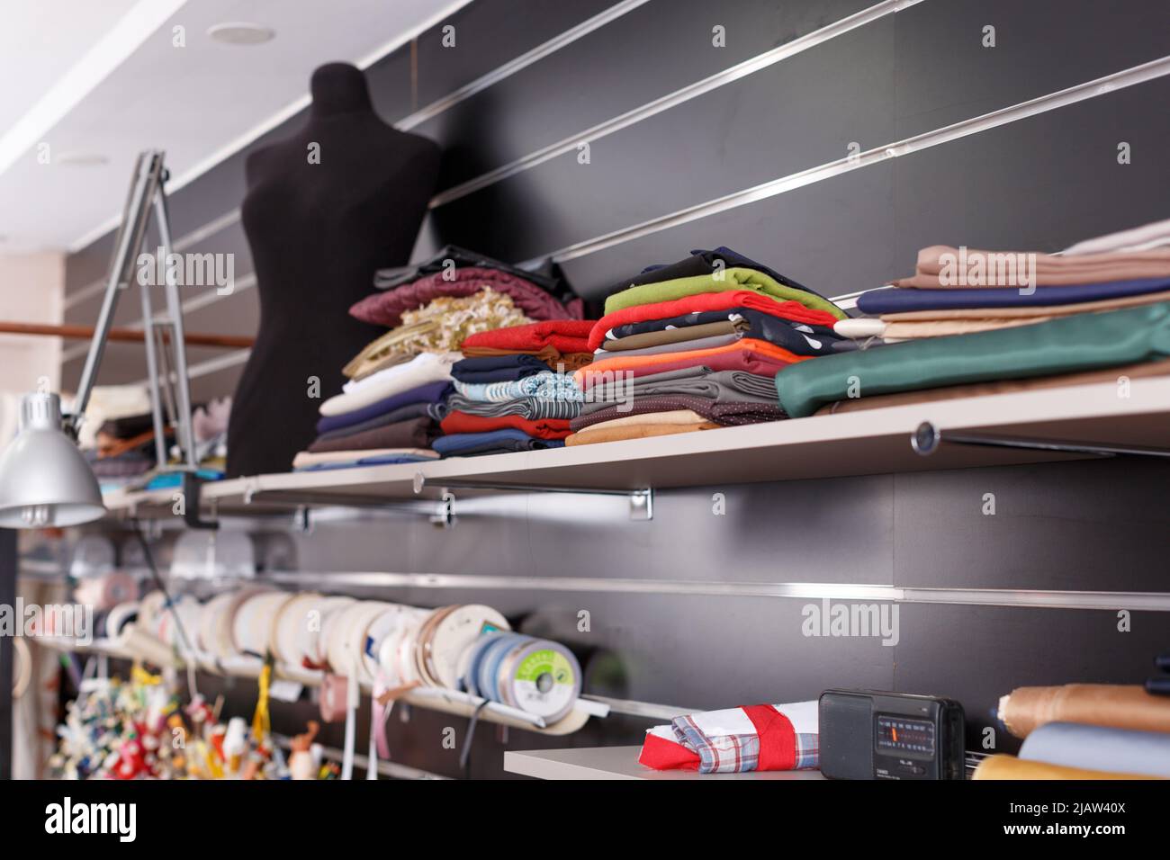 Pieces of cloth and tailor mannequin Stock Photo - Alamy