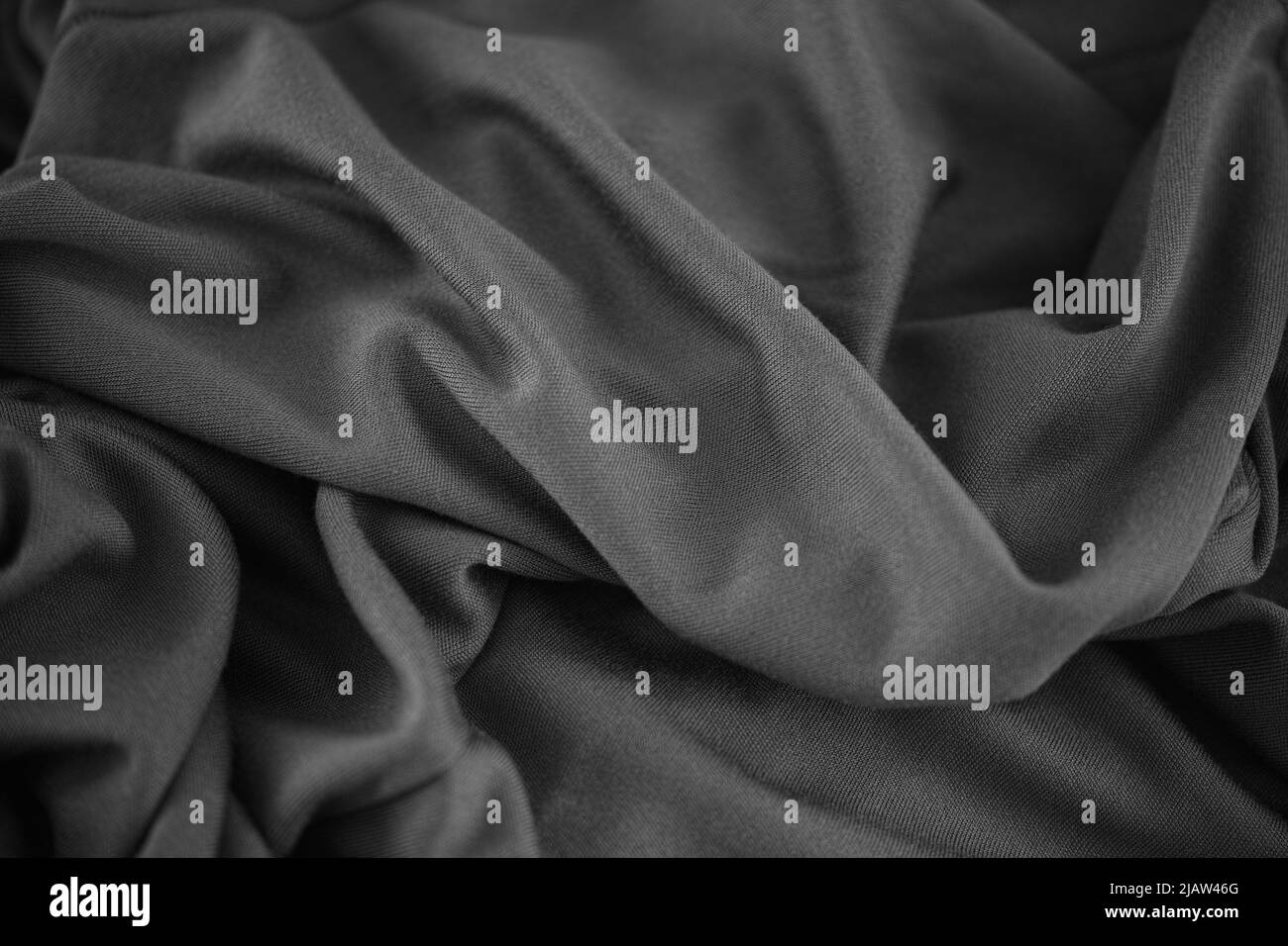 A crumpled fabric texture background. Black and white. Close up Stock ...