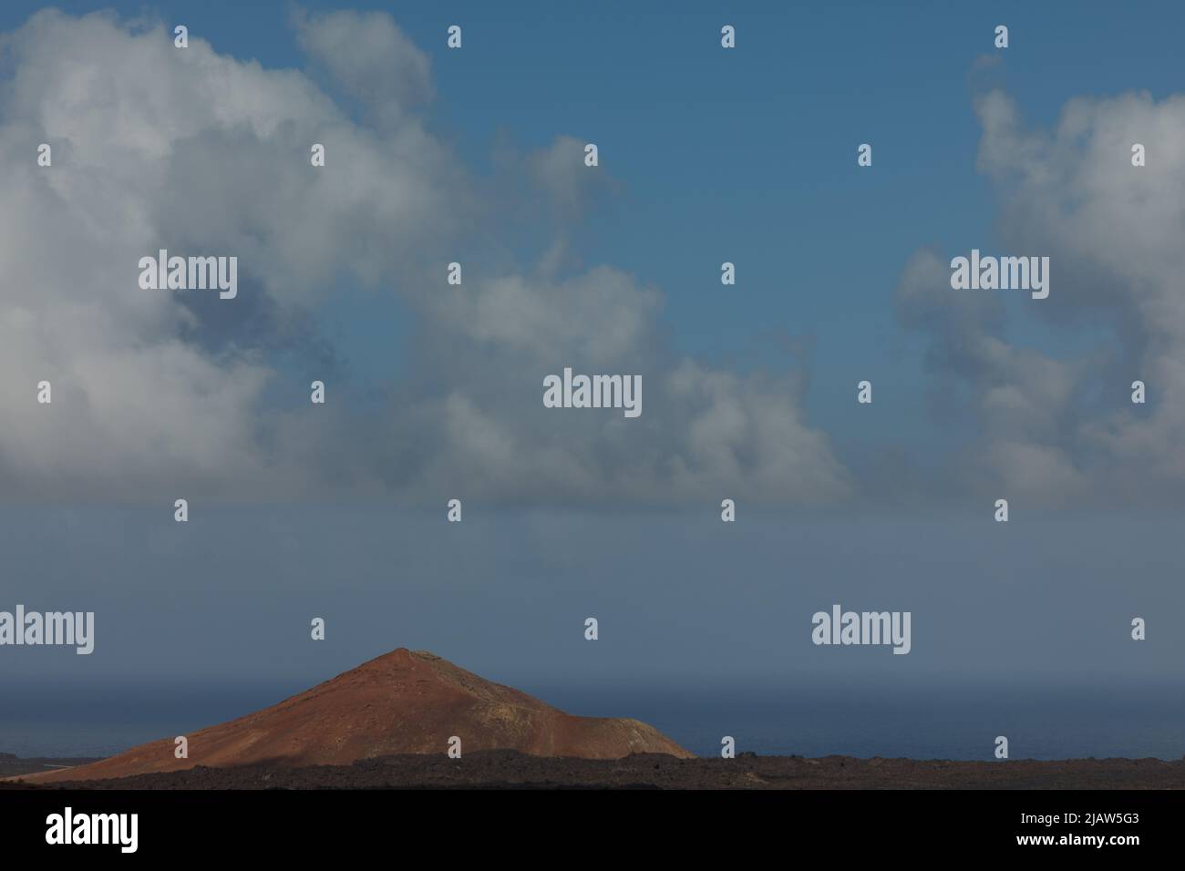 landscape with a small volcano Stock Photo - Alamy