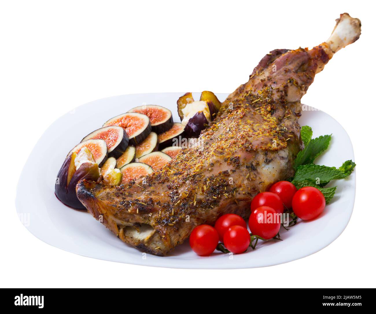 Baked shoulder of mutton with figs, tomatoes, soft cheese Stock Photo ...