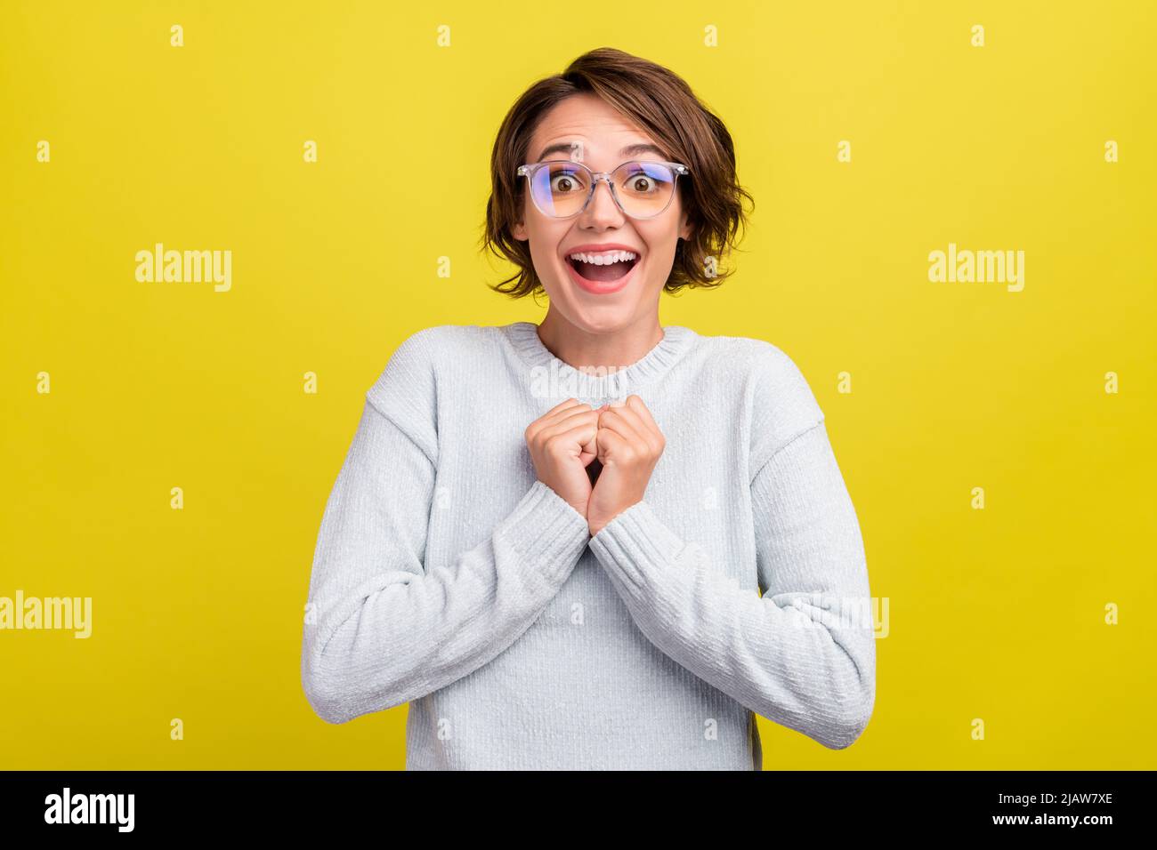 Photo of excited hopeful dreamy lady hold arms open mouth wear glasses ...