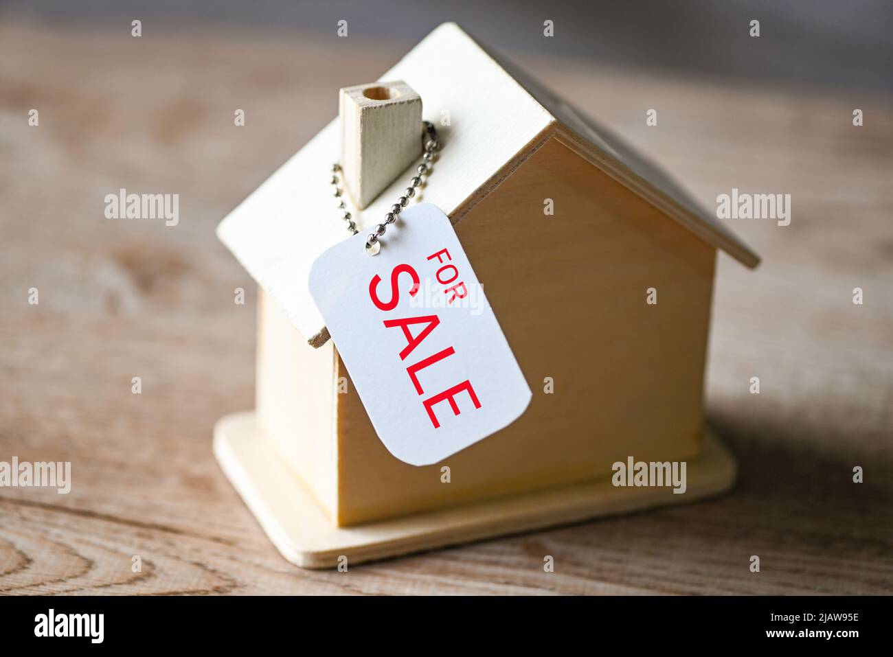 House for sale, house model on sale with hang tag or real estate home ...