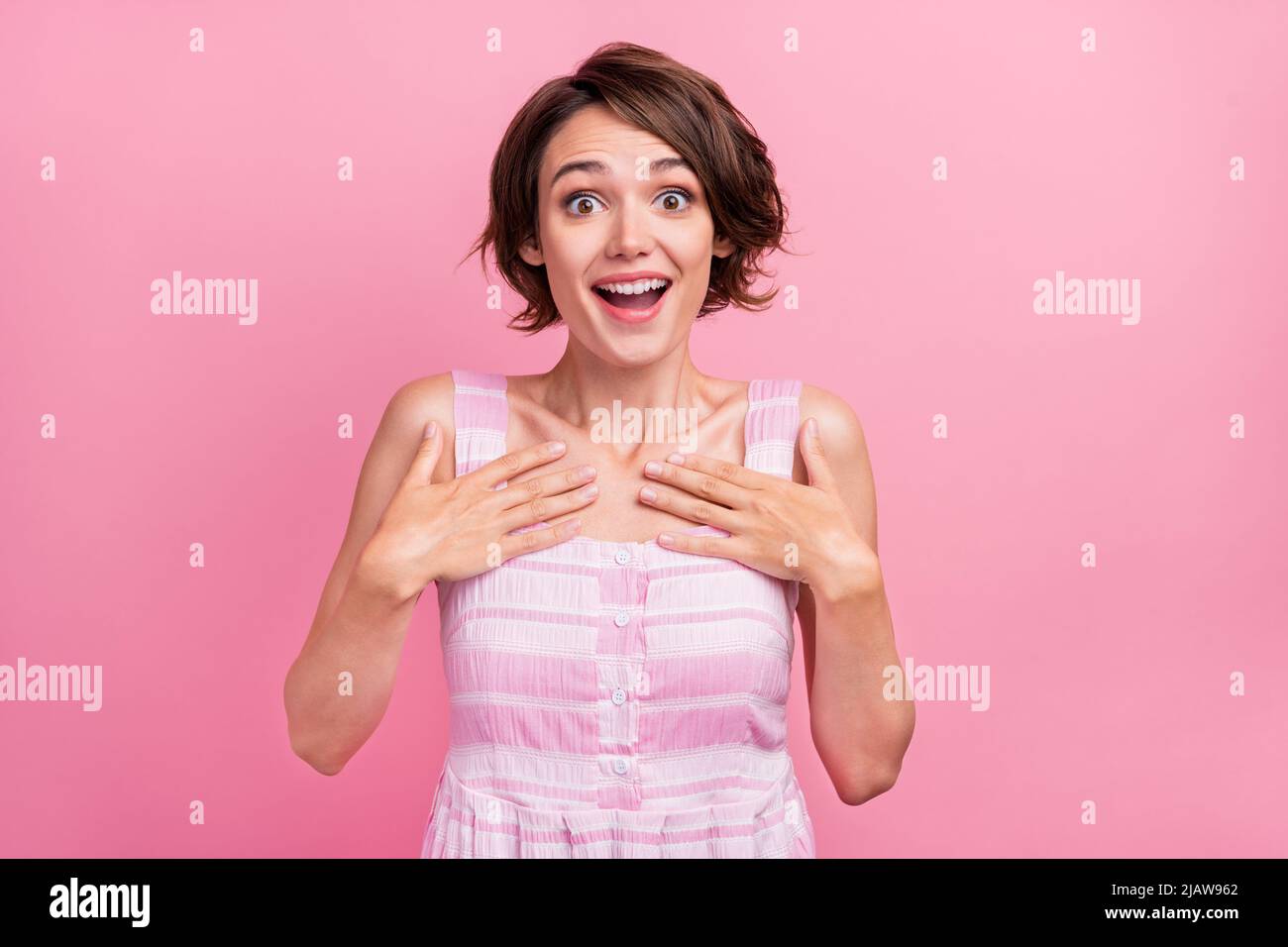 Photo of young cheerful girl hands on chest unexpected reaction ...