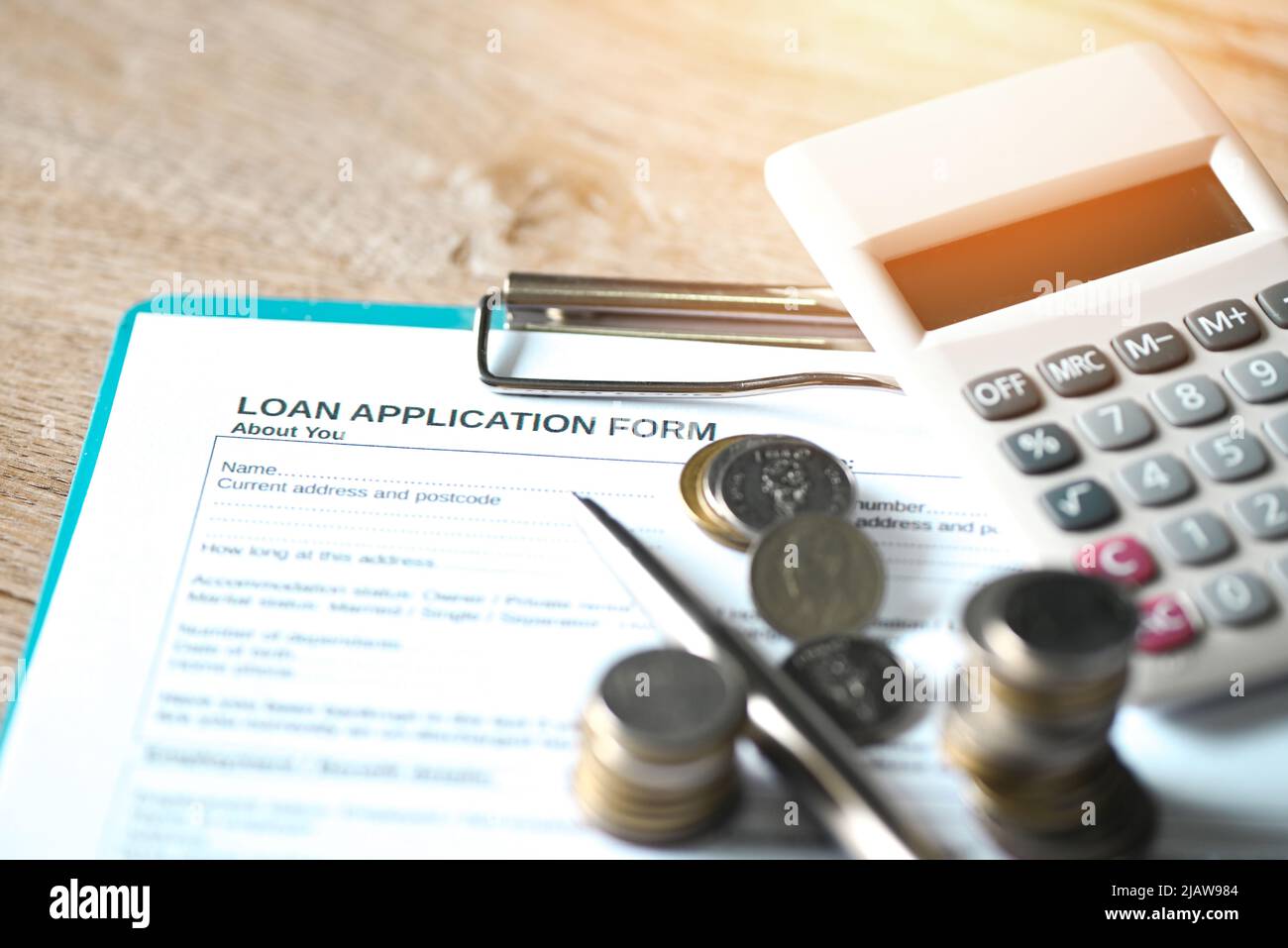 Personal loan concept with loan application form paper with calculator ...