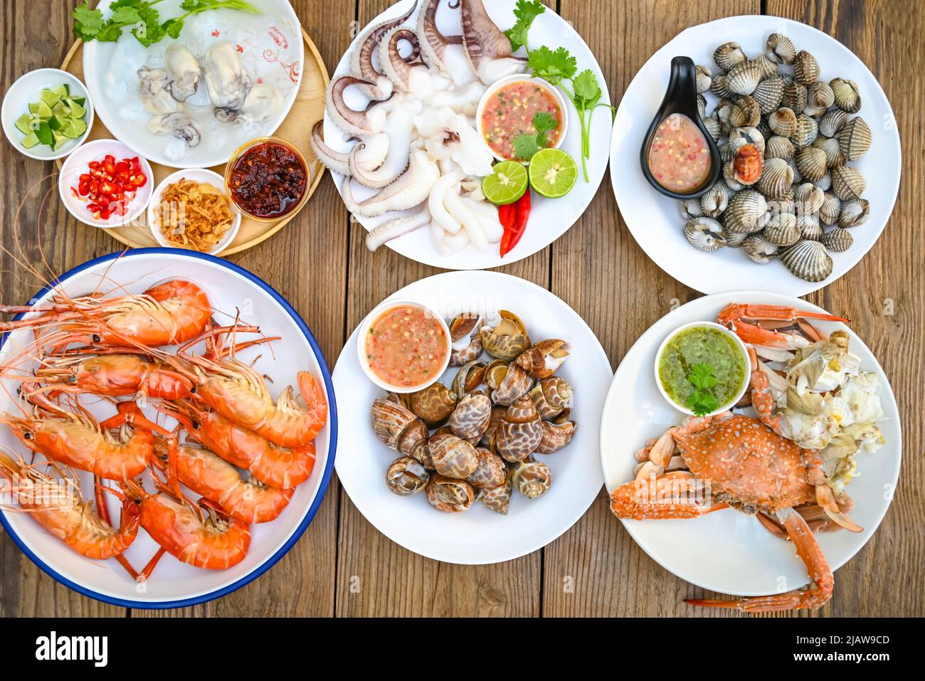 seafood plate with shrimp shellfish crab squid cockle spotted babylon ...