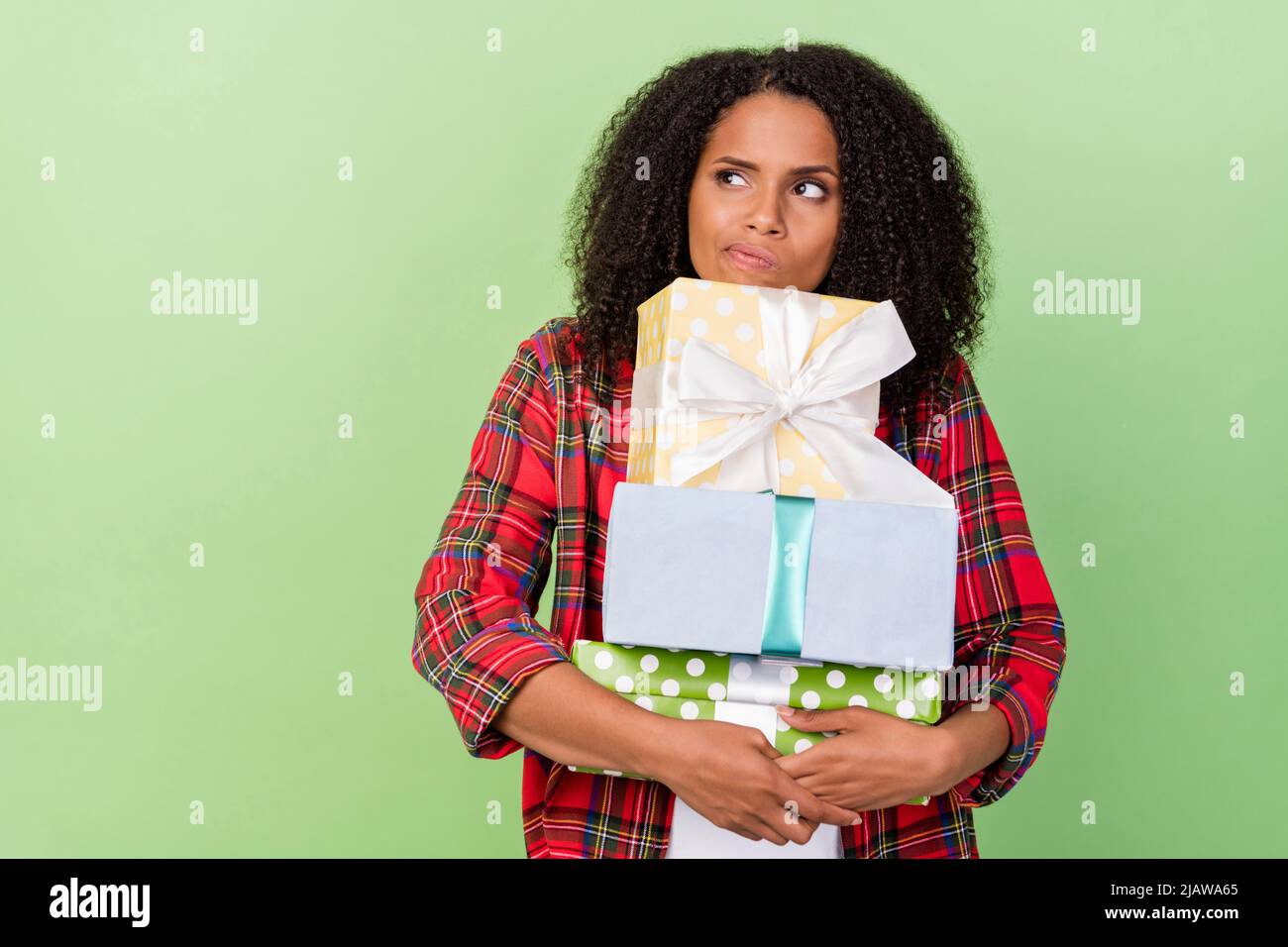 Photo of young pretty african woman embrace present box receive minded ...