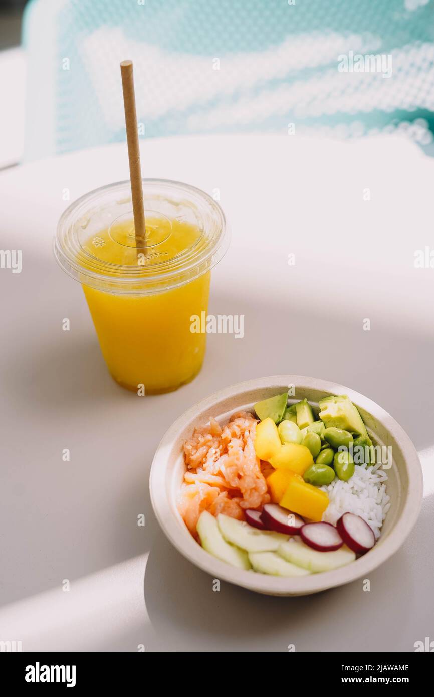 Acai bowl of salmon, rice and avocado Stock Photo - Alamy