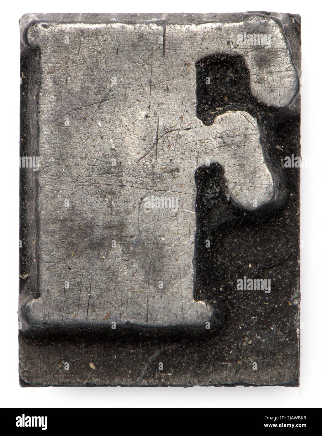 close up metal lead letter macro showing capitol F on white background ...