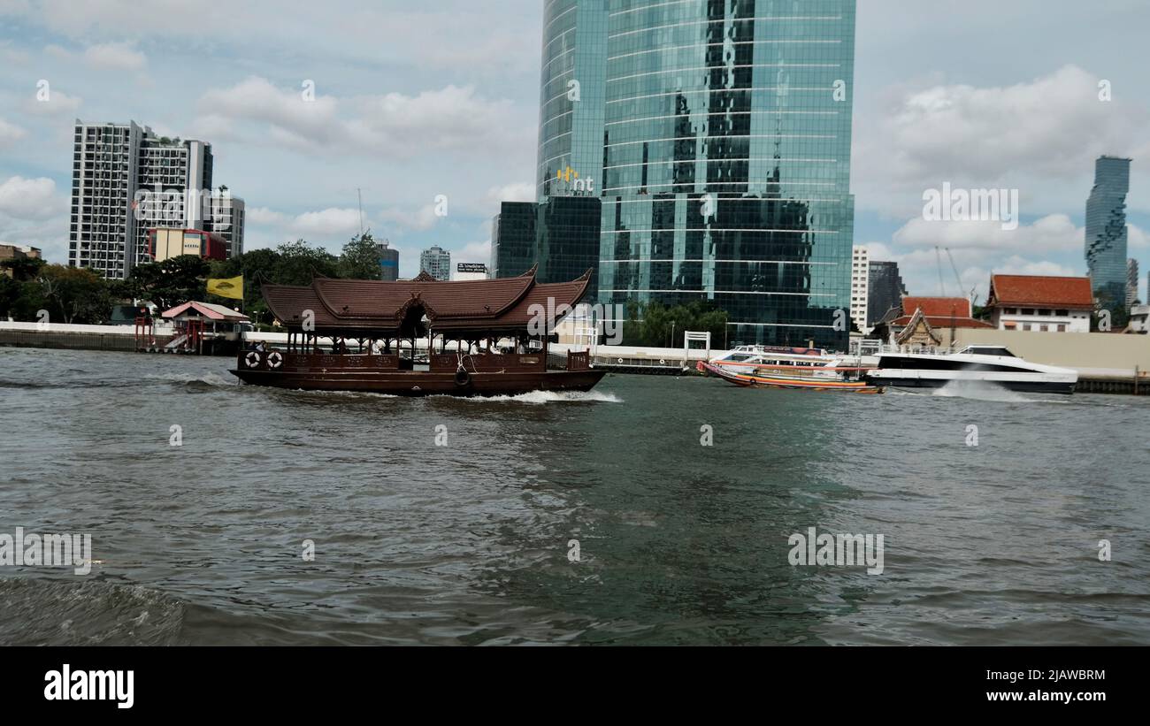 Hotel Shuttle Boat Chao on the ChaonPhraya River passing by CAT ...