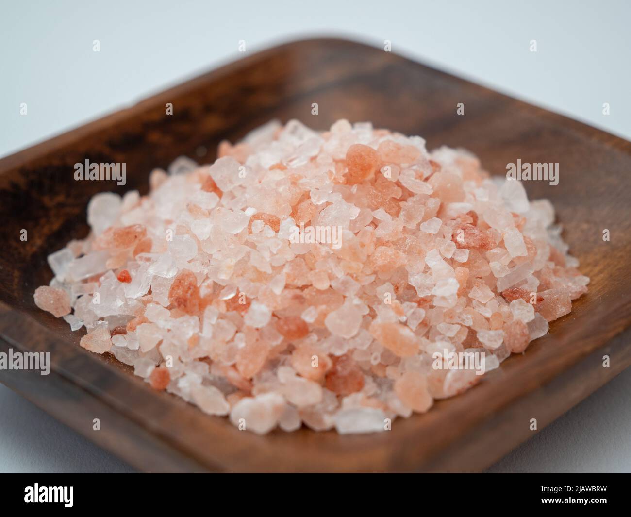 Pink salt isolated on white background. Pink salt Stock Photo - Alamy