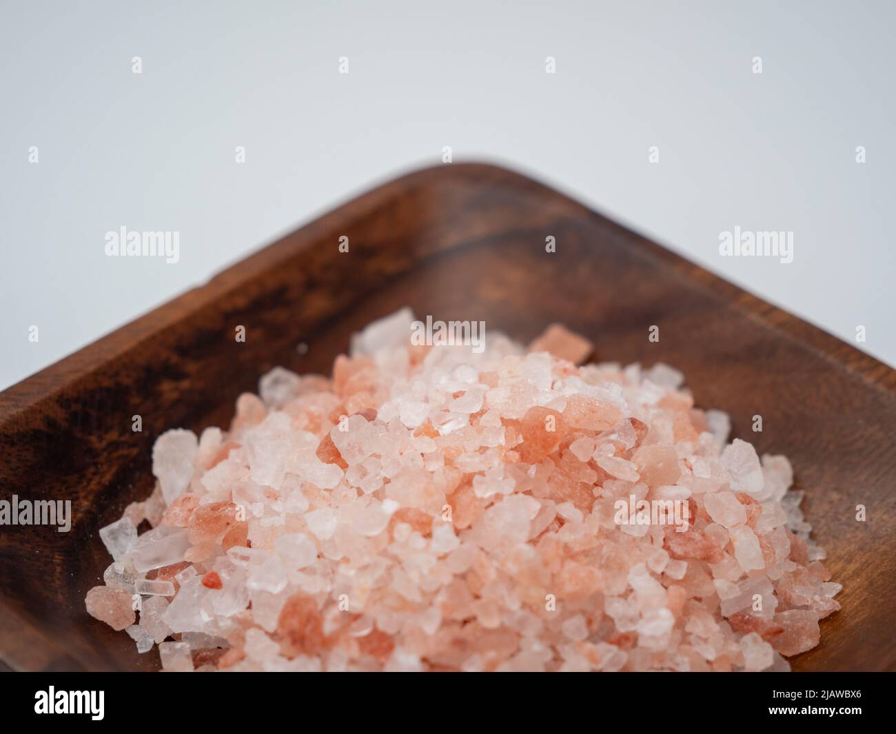 Pink salt isolated on white background. Pink salt Stock Photo - Alamy