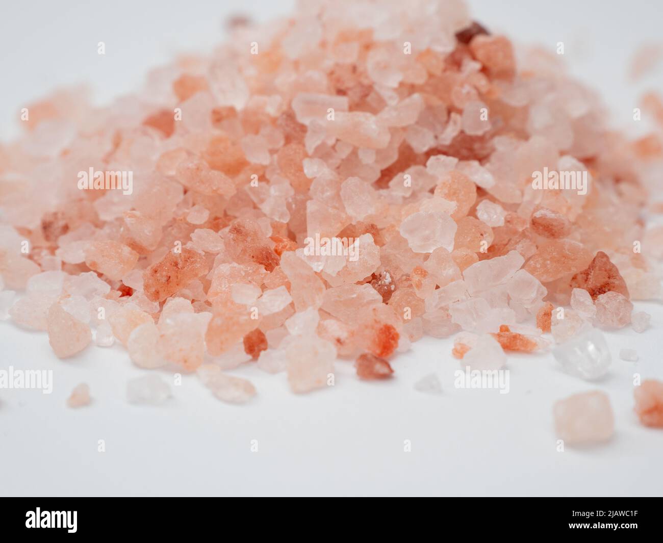 Pink salt isolated on white background. Pink salt Stock Photo - Alamy