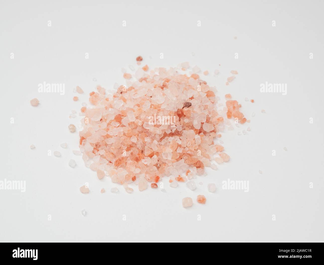 Pink salt isolated on white background. Pink salt Stock Photo - Alamy