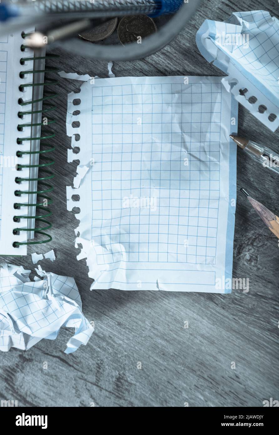 Crumpled pages and notebook Stock Photo - Alamy