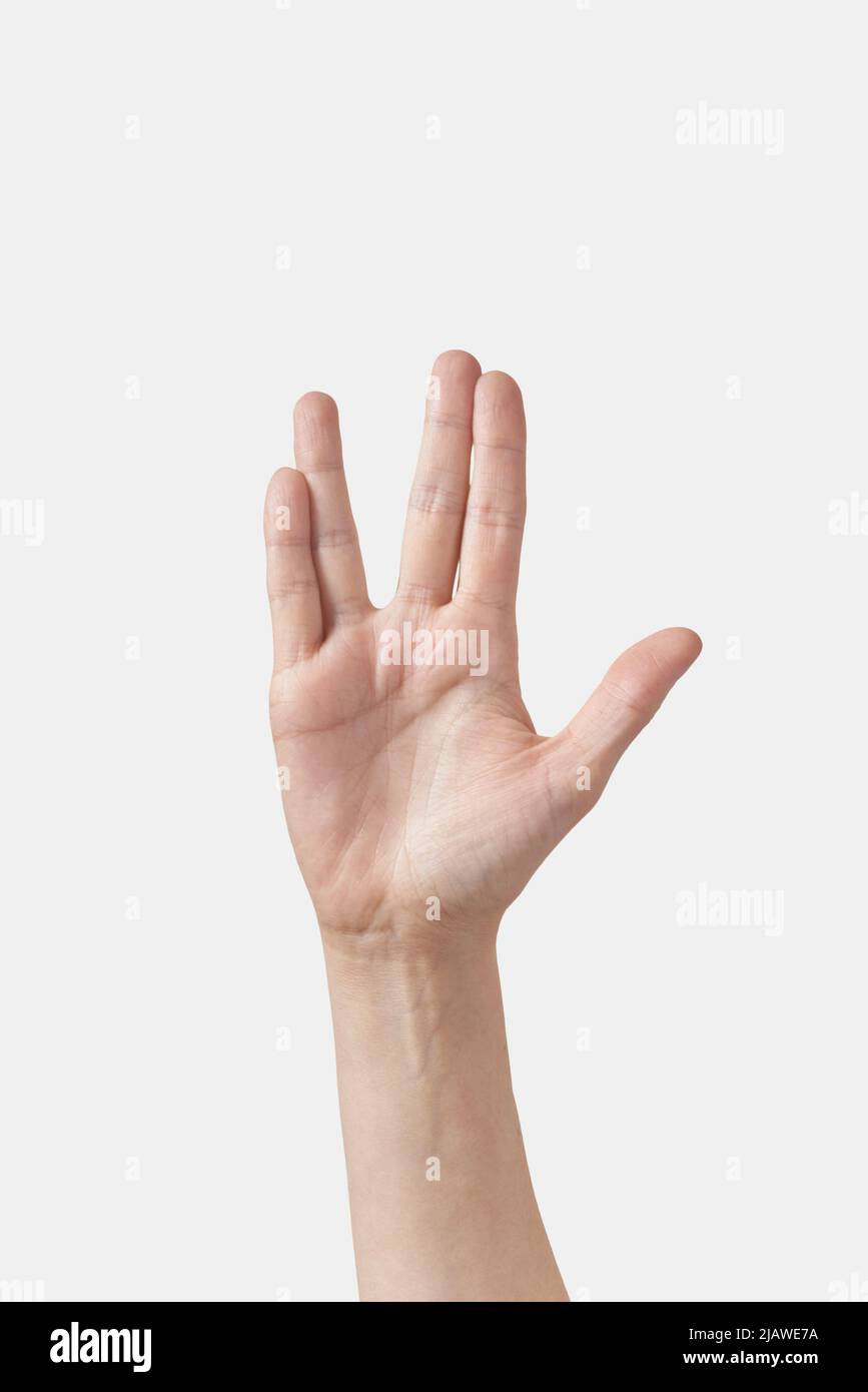 Caucasian female hand show funny weird alien peace greeting hand ...