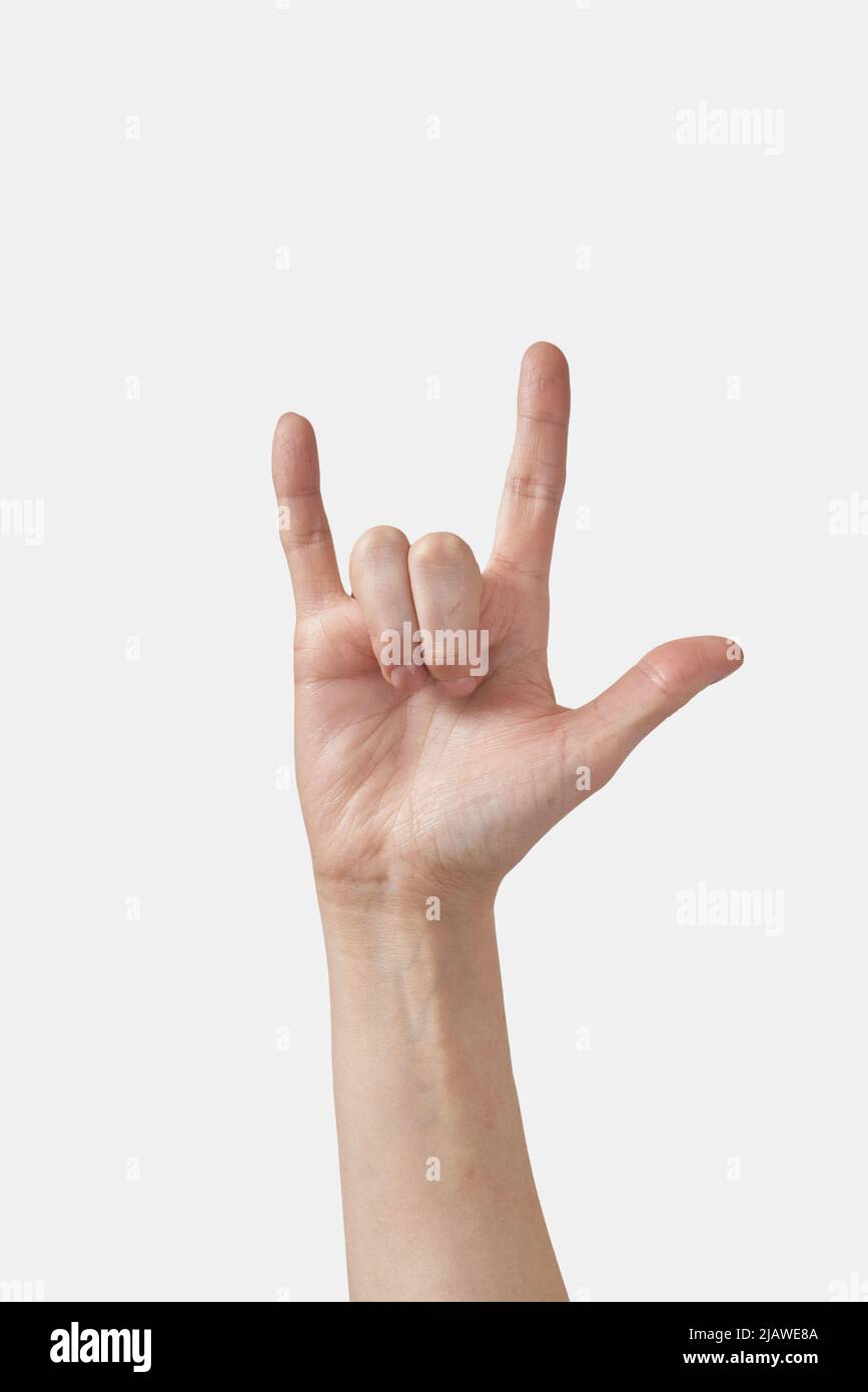 Young girl hand showing I love you gesture, sign in American sign ...