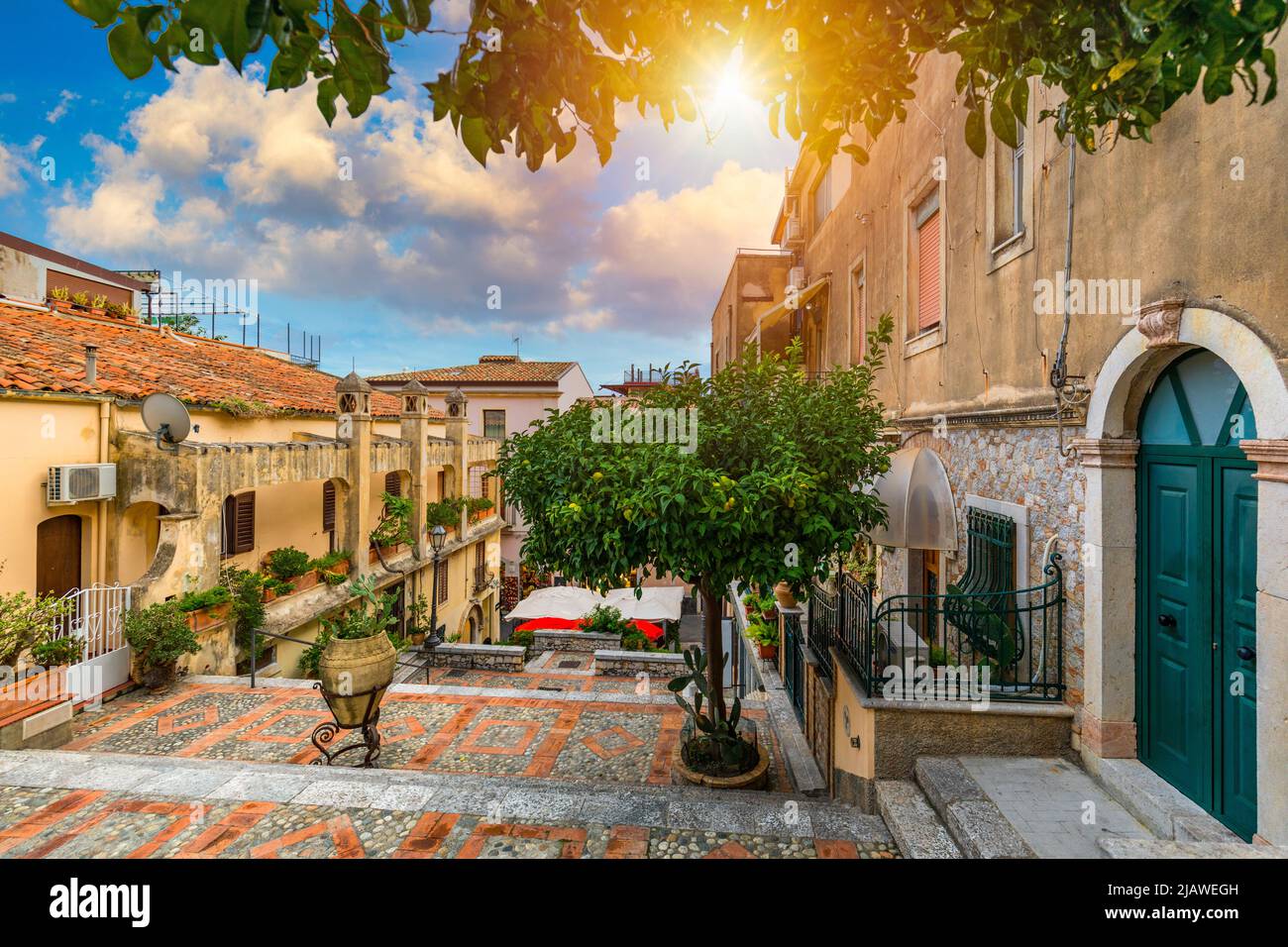 Beautiful old town of Taormina with small streets, flowers ...