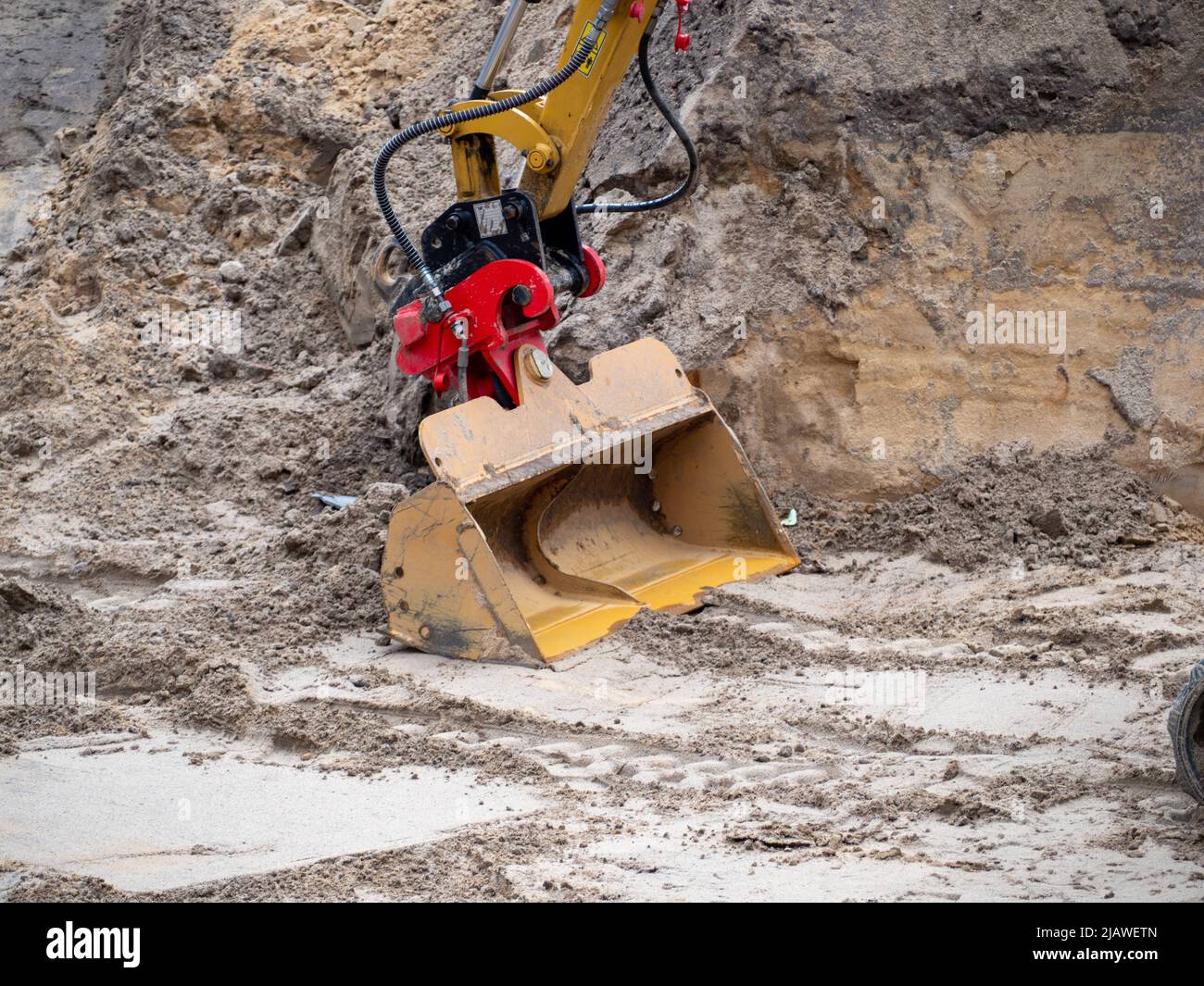Tractor bucket at a construction site. In the pit Tractor Bucket Stock ...