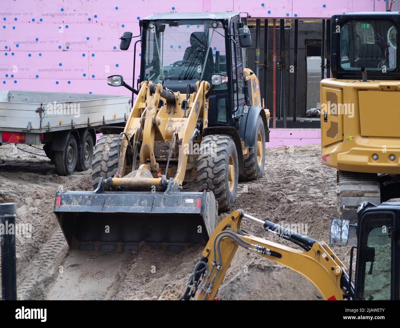 Tractor at the construction site. At the construction site yellow ...