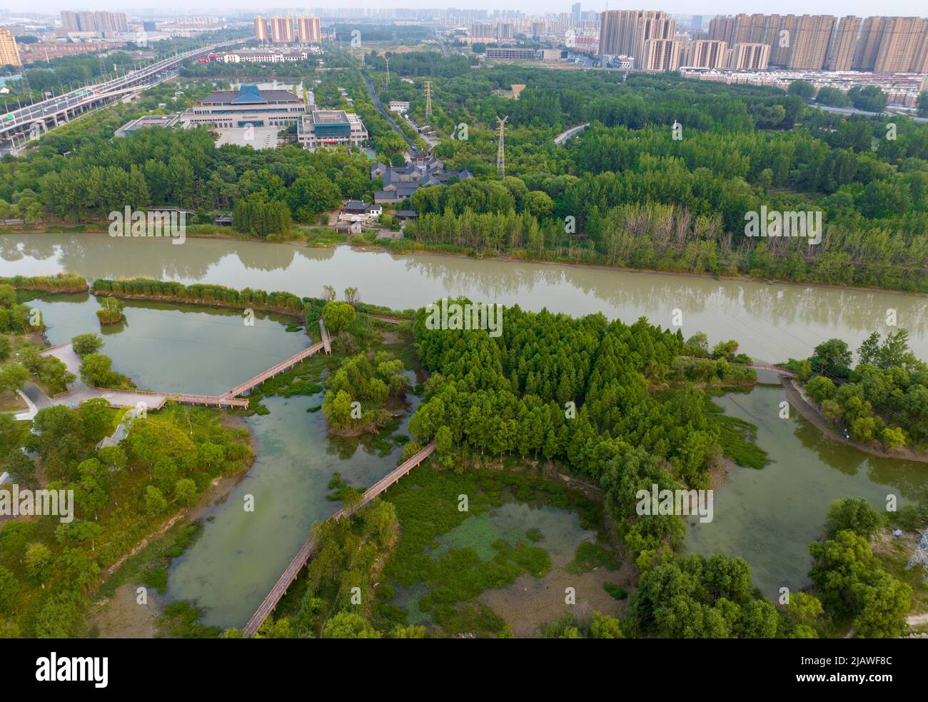 HUAI'AN, CHINA - JUNE 1, 2022 - Trees cover the ancient Huai River ...