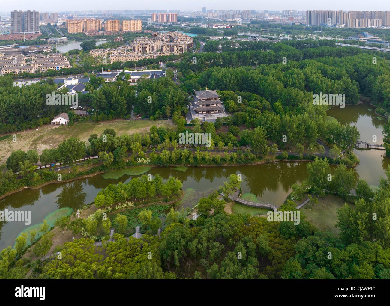 HUAI'AN, CHINA - JUNE 1, 2022 - Trees cover the ancient Huai River ...